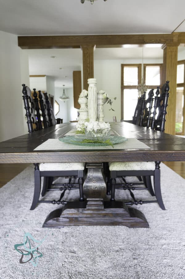 Dining table with antique, vintage, and modern touches.