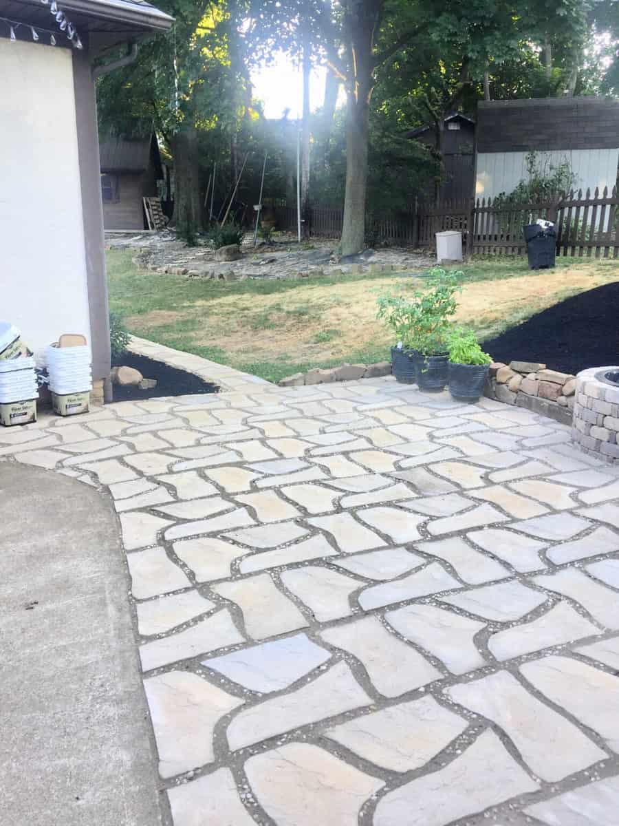 Revealing a creative DIY patio extension with pavers